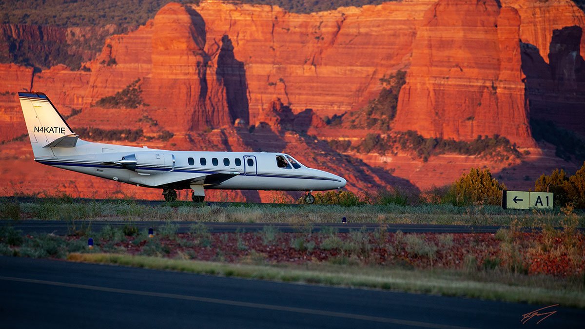 Today’s Photo from Ted Grussing Photography: Katie hijacks her first plane!